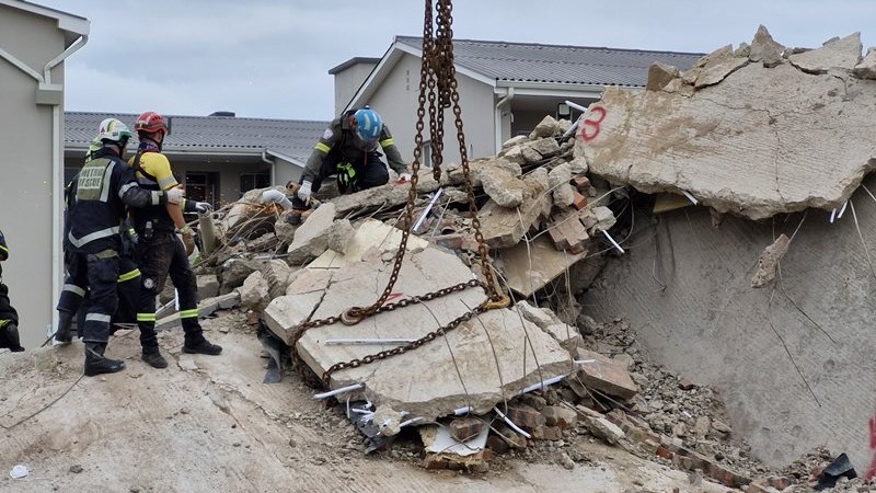 Update on building collapse: 6 more workers trapped under rubble than ...