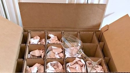 Packing china dishes and crystal glassware | George Herald