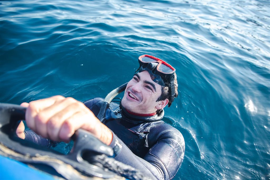 Inspirational Caleb swims with sharks to highlight their plight ...