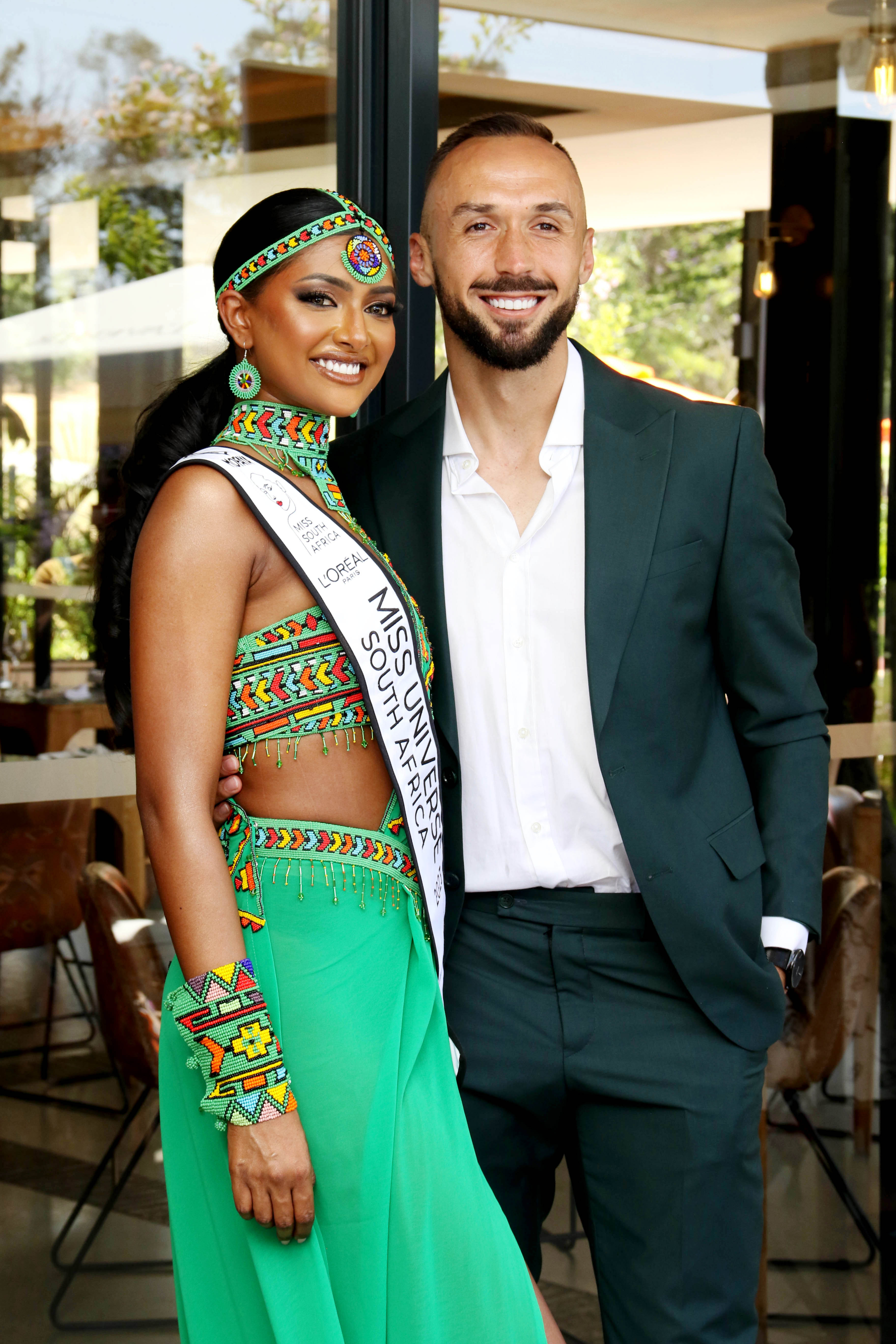 Proudly showcasing the green and gold at the Miss Universe pageant ...